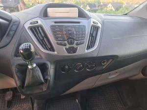 White Ford Tourneo Custom 2014 in Prienai, with an engine capacity of 2.20 L and mileage of 205 thousand km for 7900 €, photo 19 on AUTOMOTO.COM.LV