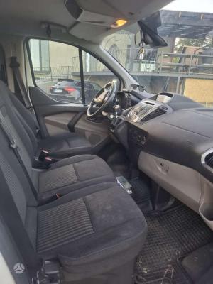 White Ford Tourneo Custom 2014 in Prienai, with an engine capacity of 2.20 L and mileage of 205 thousand km for 7900 €, photo 22 on AUTOMOTO.COM.LV