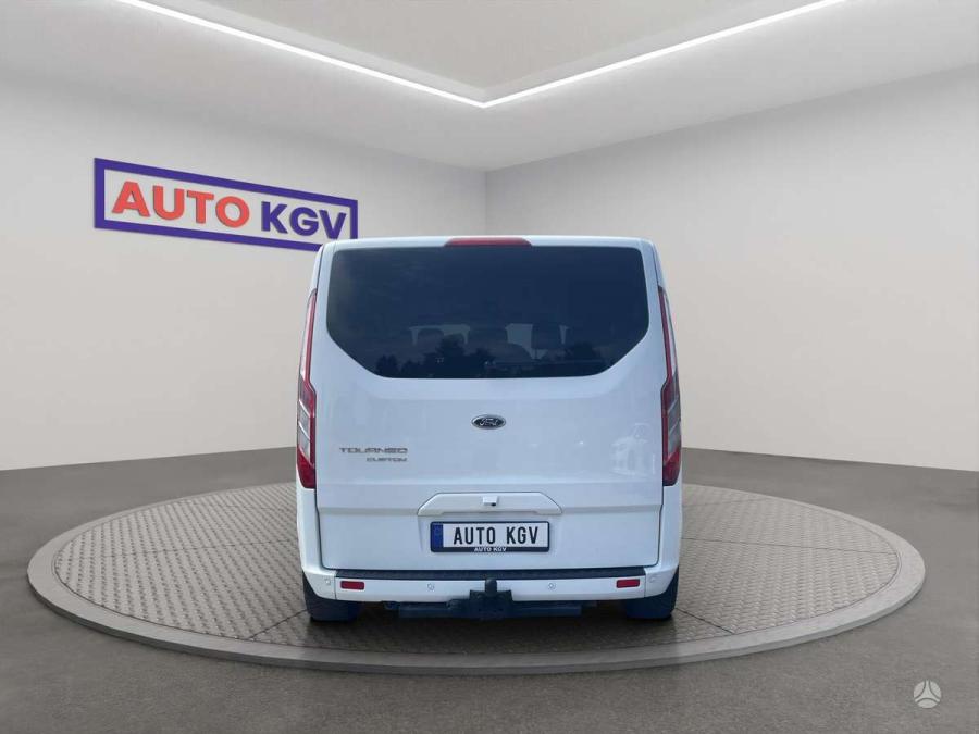 White Ford Tourneo Custom 2019 in Vilnius, with an engine capacity of 2.00 L and mileage of 243 thousand km for 21999 €, photo 4 on AUTOMOTO.COM.LV