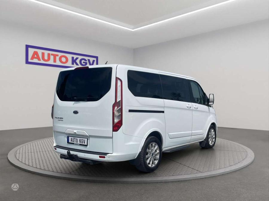 White Ford Tourneo Custom 2019 in Vilnius, with an engine capacity of 2.00 L and mileage of 243 thousand km for 21999 €, photo 5 on AUTOMOTO.COM.LV