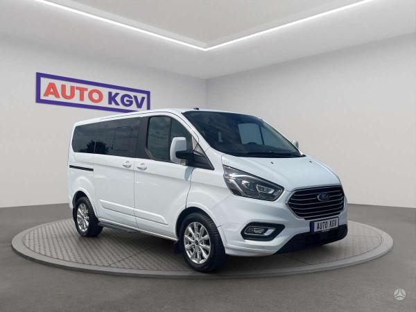 White Ford Tourneo Custom 2019 in Vilnius, with an engine capacity of 2.00 L and mileage of 243 thousand km for 21999 €, photo 6 on AUTOMOTO.COM.LV