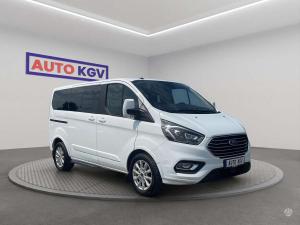White Ford Tourneo Custom 2019 in Vilnius, with an engine capacity of 2.00 L and mileage of 243 thousand km for 21999 €, photo 7 on AUTOMOTO.COM.LV