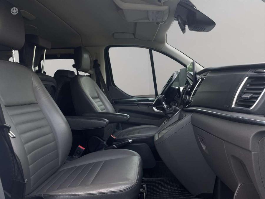 White Ford Tourneo Custom 2019 in Vilnius, with an engine capacity of 2.00 L and mileage of 243 thousand km for 21999 €, photo 8 on AUTOMOTO.COM.LV