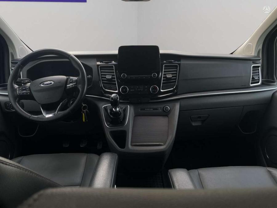 White Ford Tourneo Custom 2019 in Vilnius, with an engine capacity of 2.00 L and mileage of 243 thousand km for 21999 €, photo 12 on AUTOMOTO.COM.LV