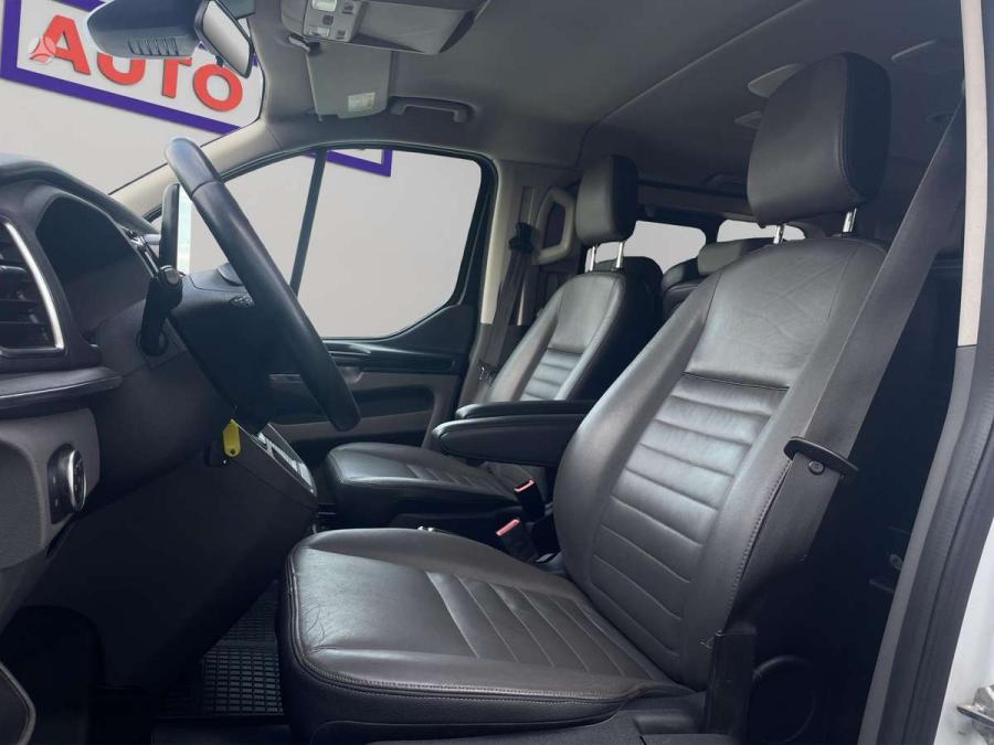 White Ford Tourneo Custom 2019 in Vilnius, with an engine capacity of 2.00 L and mileage of 243 thousand km for 21999 €, photo 14 on AUTOMOTO.COM.LV