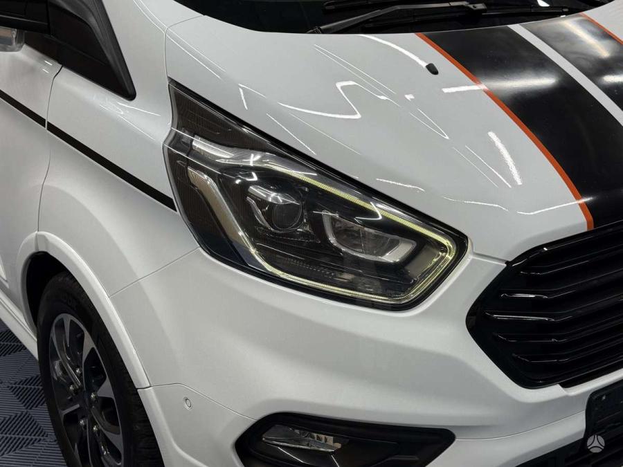 White Ford Tourneo Custom 2020 in Marijampole, with an engine capacity of 2.00 L and mileage of 232 thousand km for 22900 €, photo 28 on AUTOMOTO.COM.LV