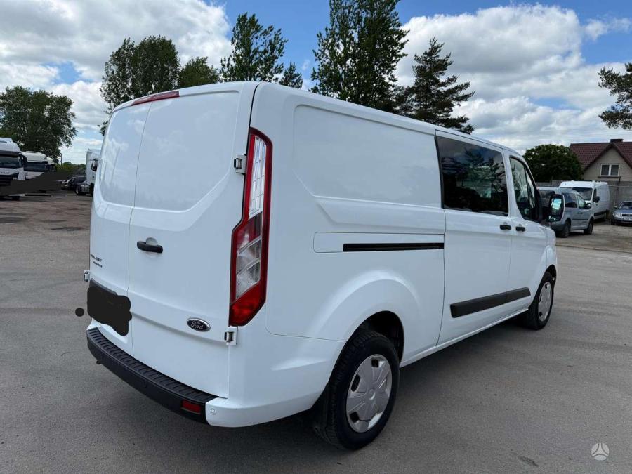 White Ford Tourneo Custom 2022 in Mazeikiai, with an engine capacity of 2.00 L and mileage of 510 thousand km for 9075 €, photo 5 on AUTOMOTO.COM.LV