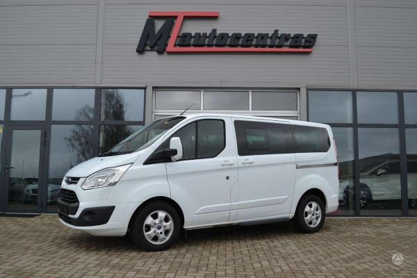 White Ford Tourneo Custom 2015 in Vilnius, with an engine capacity of 2.20 L and mileage of 202 thousand km for 13000 €, photo 1 on AUTOMOTO.COM.LV