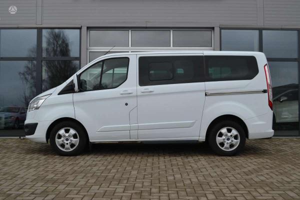 White Ford Tourneo Custom 2015 in Vilnius, with an engine capacity of 2.20 L and mileage of 202 thousand km for 13000 €, photo 6 on AUTOMOTO.COM.LV