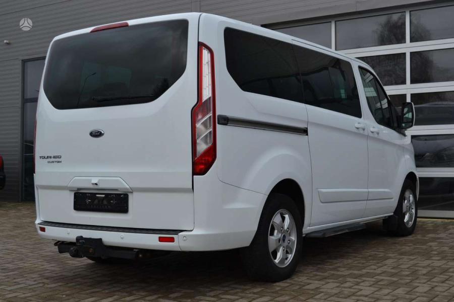 White Ford Tourneo Custom 2015 in Vilnius, with an engine capacity of 2.20 L and mileage of 202 thousand km for 13000 €, photo 9 on AUTOMOTO.COM.LV