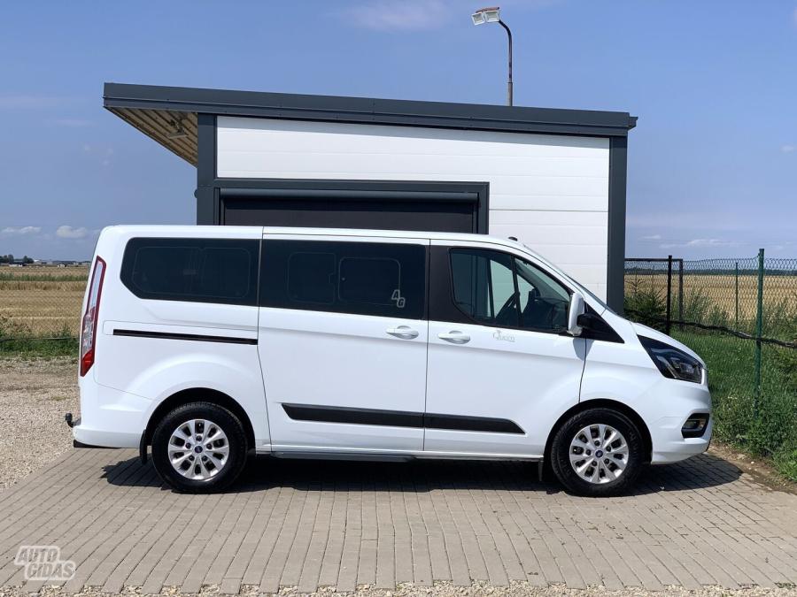 White Ford Tourneo Custom 2018 in Kaunas, with an engine capacity of 2.00 L and mileage of 192 thousand km for 17999 €, photo 9 on AUTOMOTO.COM.LV