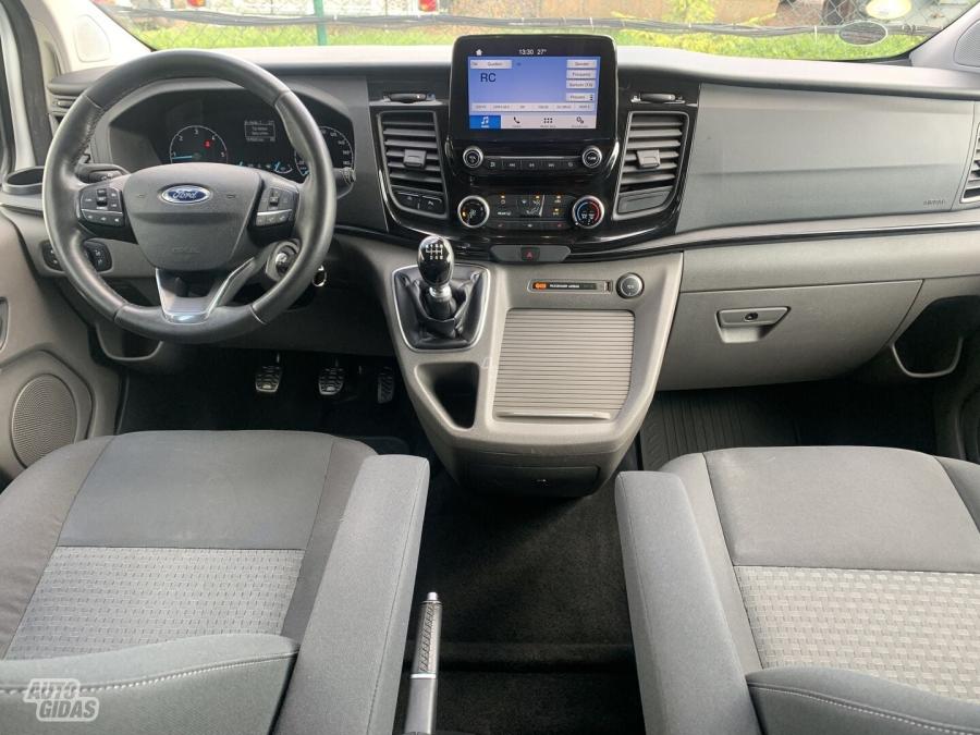 White Ford Tourneo Custom 2018 in Kaunas, with an engine capacity of 2.00 L and mileage of 192 thousand km for 17999 €, photo 12 on AUTOMOTO.COM.LV