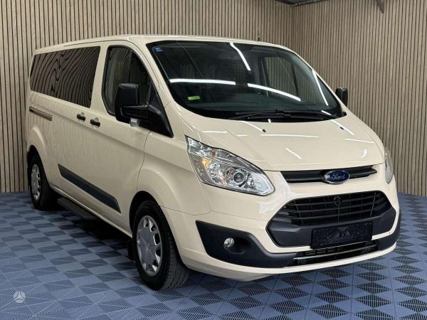 Yellow Ford Tourneo Custom 2018 in Marijampole, with an engine capacity of 2.00 L and mileage of 283 thousand km for 12900 €, photo 1 on AUTOMOTO.COM.LV