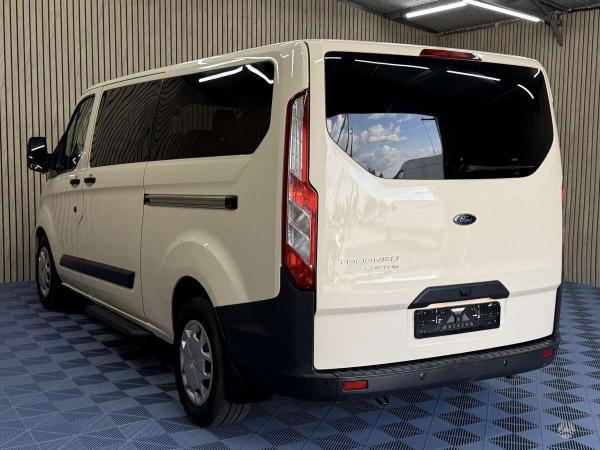 Yellow Ford Tourneo Custom 2018 in Marijampole, with an engine capacity of 2.00 L and mileage of 283 thousand km for 12900 €, photo 5 on AUTOMOTO.COM.LV