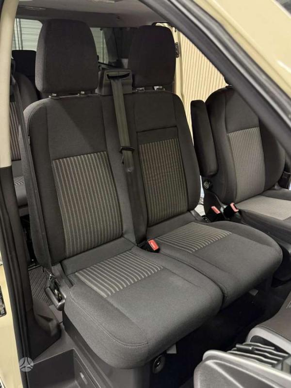Yellow Ford Tourneo Custom 2018 in Marijampole, with an engine capacity of 2.00 L and mileage of 283 thousand km for 12900 €, photo 10 on AUTOMOTO.COM.LV