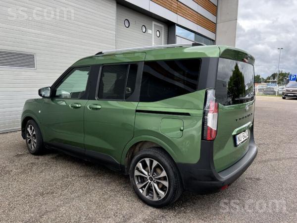 Green Ford Tourneo 2024 in Riga, with an engine capacity of 1.00 L and mileage of 74 thousand km for 17995 €, photo 3 on AUTOMOTO.COM.LV
