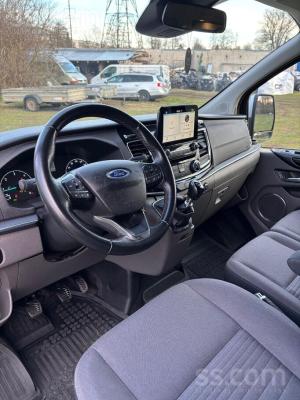 Grey Ford Tourneo 2019 in Riga, with an engine capacity of 2.00 L and mileage of 131 thousand km for 22590 €, photo 10 on AUTOMOTO.COM.LV