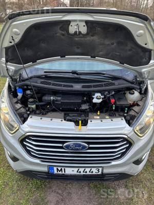 Grey Ford Tourneo 2019 in Riga, with an engine capacity of 2.00 L and mileage of 131 thousand km for 22590 €, photo 21 on AUTOMOTO.COM.LV