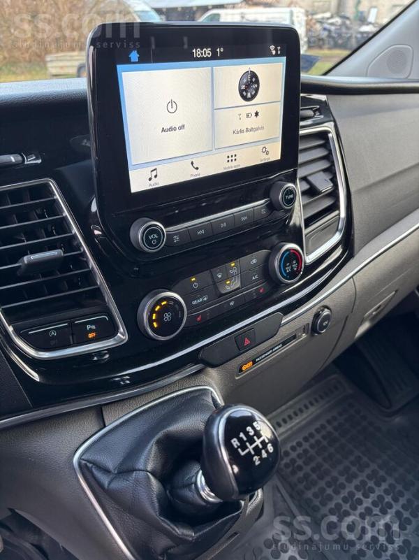 Grey Ford Tourneo 2019 in Riga, with an engine capacity of 2.00 L and mileage of 131 thousand km for 21990 €, photo 7 on AUTOMOTO.COM.LV