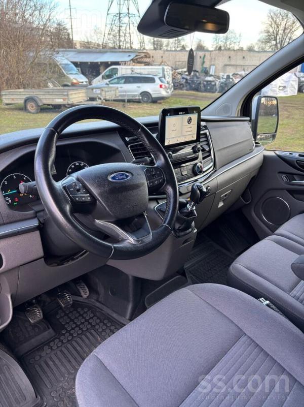 Grey Ford Tourneo 2019 in Riga, with an engine capacity of 2.00 L and mileage of 131 thousand km for 21990 €, photo 9 on AUTOMOTO.COM.LV
