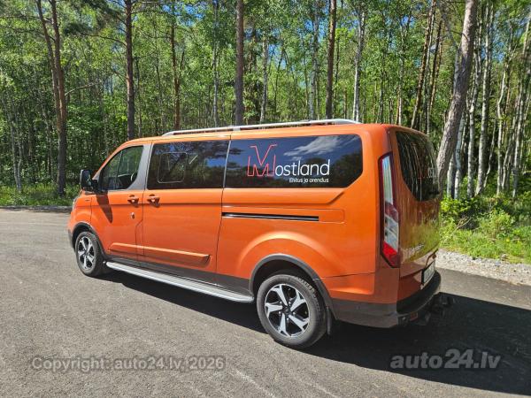 Orange Ford Tourneo 2022 in Tallinn, with an engine capacity of 2.00 L and mileage of 107 thousand km for 29500 €, photo 2 on AUTOMOTO.COM.LV