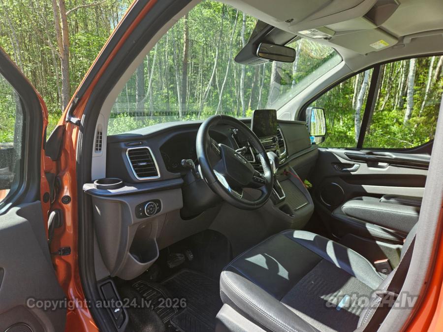 Orange Ford Tourneo 2022 in Tallinn, with an engine capacity of 2.00 L and mileage of 107 thousand km for 29500 €, photo 4 on AUTOMOTO.COM.LV