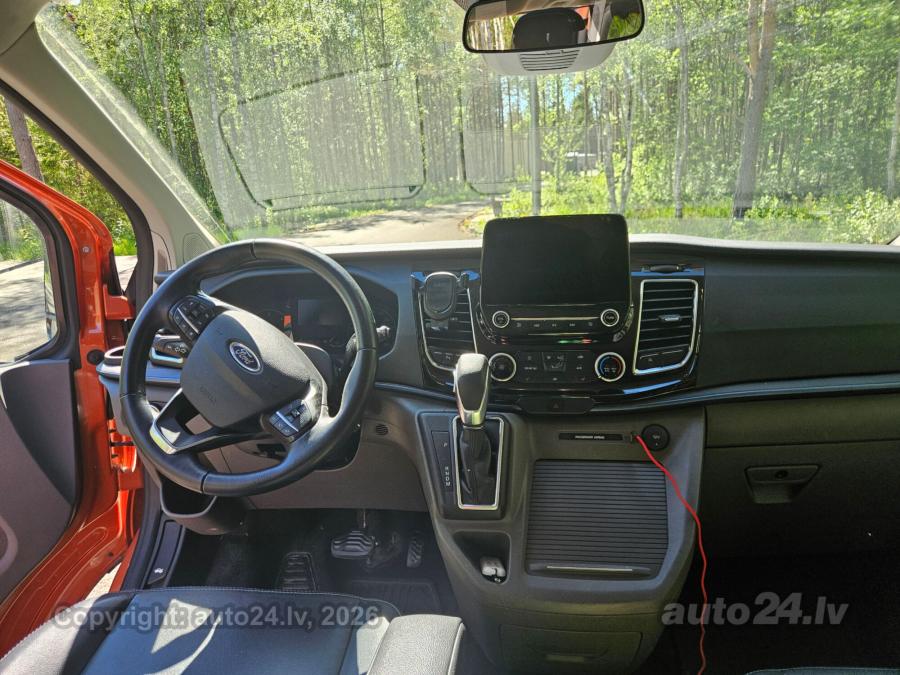 Orange Ford Tourneo 2022 in Tallinn, with an engine capacity of 2.00 L and mileage of 107 thousand km for 29500 €, photo 5 on AUTOMOTO.COM.LV