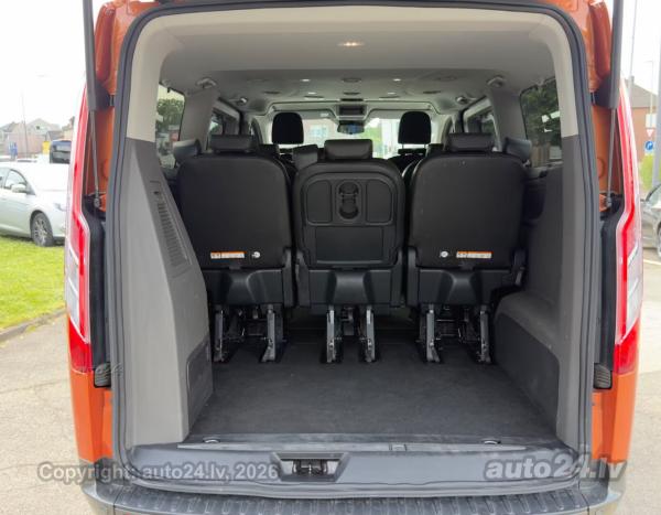 Orange Ford Tourneo 2022 in Tartu, with an engine capacity of 2.00 L and mileage of 96 thousand km for 32790 €, photo 4 on AUTOMOTO.COM.LV