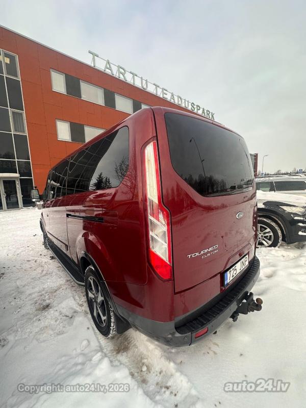 Red Ford Tourneo 2021 in Tallinn, with an engine capacity of 2.00 L and mileage of 226 thousand km for 26900 €, photo 6 on AUTOMOTO.COM.LV