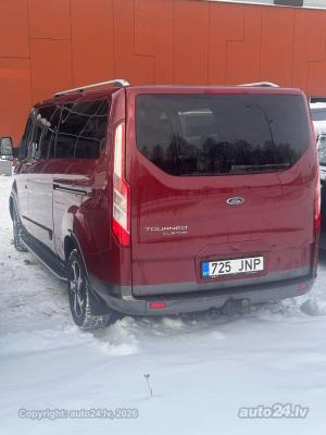 Red Ford Tourneo 2021 in Tallinn, with an engine capacity of 2.00 L and mileage of 226 thousand km for 26900 €, photo 7 on AUTOMOTO.COM.LV