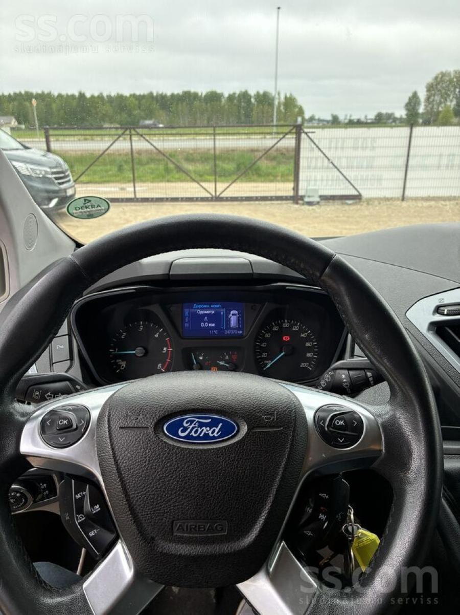 White Ford Tourneo 2013 in Riga, with an engine capacity of 2.20 L and mileage of 247 thousand km for 8900 €, photo 6 on AUTOMOTO.COM.LV