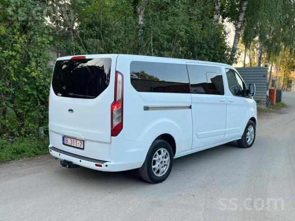 White Ford Tourneo 2013 in Riga, with an engine capacity of 2.20 L and mileage of 0 thousand km for 5999 €, photo 6 on AUTOMOTO.COM.LV