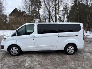 White Ford Tourneo 2018 in Riga, with an engine capacity of 2.00 L and mileage of 103 thousand km for 19800 €, photo 4 on AUTOMOTO.COM.LV