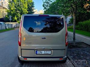 Yellow Ford Tourneo 2017 in Riga, with an engine capacity of 2.00 L and mileage of 425 thousand km for 10957 €, photo 4 on AUTOMOTO.COM.LV
