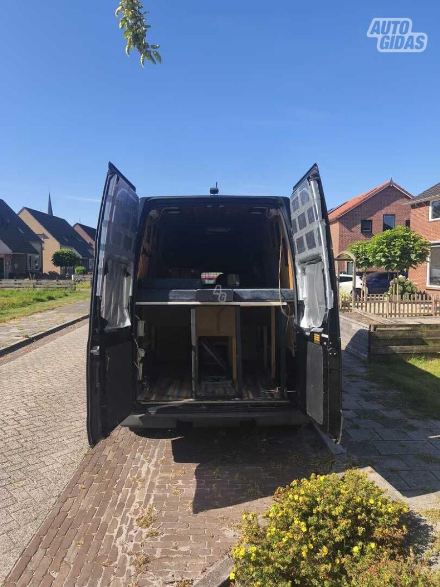 Black Ford Transit 2004 in Vilnius, with an engine capacity of 2.00 L and mileage of 317 thousand km for 5555 €, photo 8 on AUTOMOTO.COM.LV