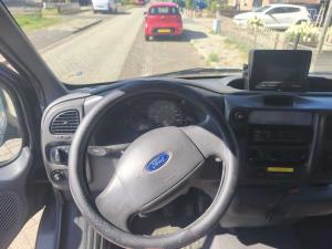Black Ford Transit 2004 in Vilnius, with an engine capacity of 2.00 L and mileage of 317 thousand km for 5555 €, photo 12 on AUTOMOTO.COM.LV