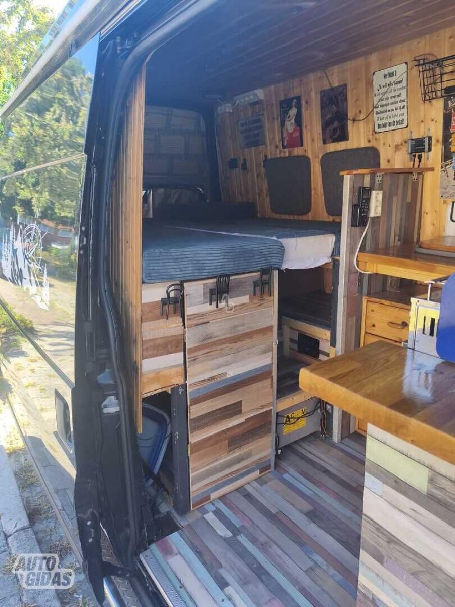 Black Ford Transit 2004 in Vilnius, with an engine capacity of 2.00 L and mileage of 317 thousand km for 5555 €, photo 17 on AUTOMOTO.COM.LV