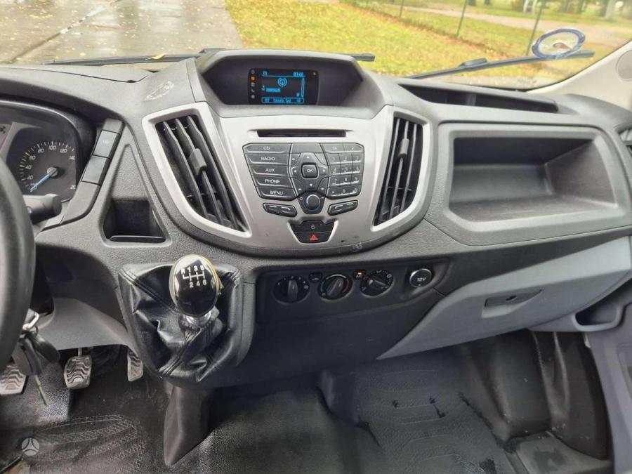 Black Ford Transit 2015 in Taurage, with an engine capacity of 2.20 L and mileage of 241 thousand km for 5300 €, photo 12 on AUTOMOTO.COM.LV