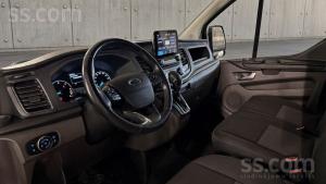 Black Ford Transit 2018 in Riga, with an engine capacity of 2.00 L and mileage of 217 thousand km for 13900 €, photo 6 on AUTOMOTO.COM.LV