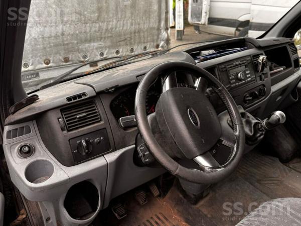 Black Ford Transit 2011 in Daugavpils, with an engine capacity of 2.20 L and mileage of 238 thousand km for 2970 €, photo 7 on AUTOMOTO.COM.LV