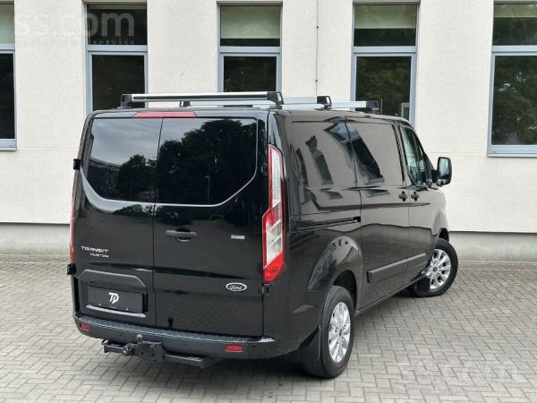 Black Ford Transit 2018 in Jelgava, with an engine capacity of 2.00 L and mileage of 180 thousand km for 10900 €, photo 6 on AUTOMOTO.COM.LV