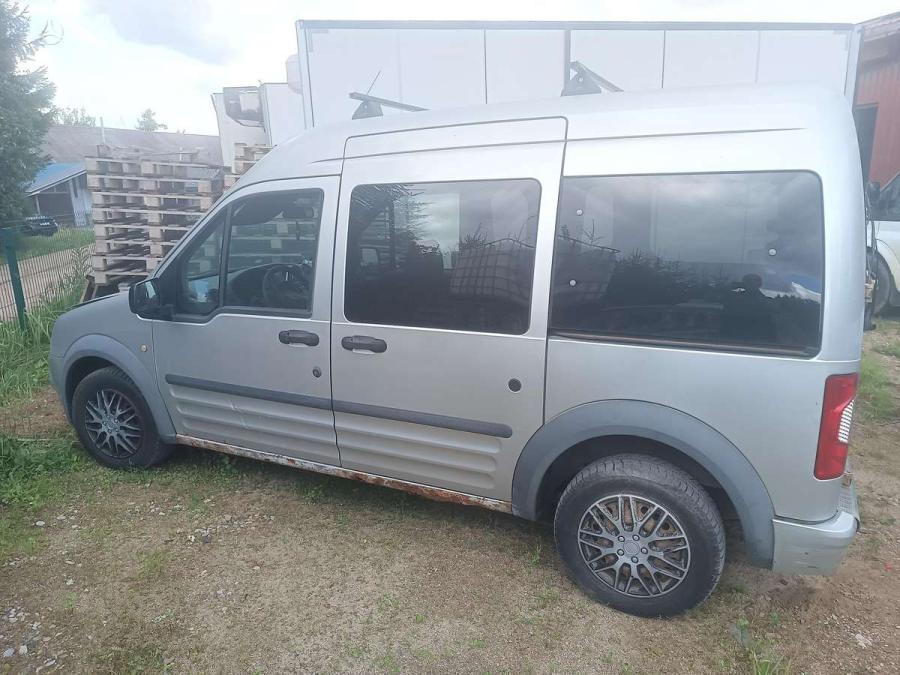 Grey Ford Transit Connect 2012 in Moletai, with an engine capacity of 1.75 L and mileage of 250 thousand km for 990 €, photo 3 on AUTOMOTO.COM.LV
