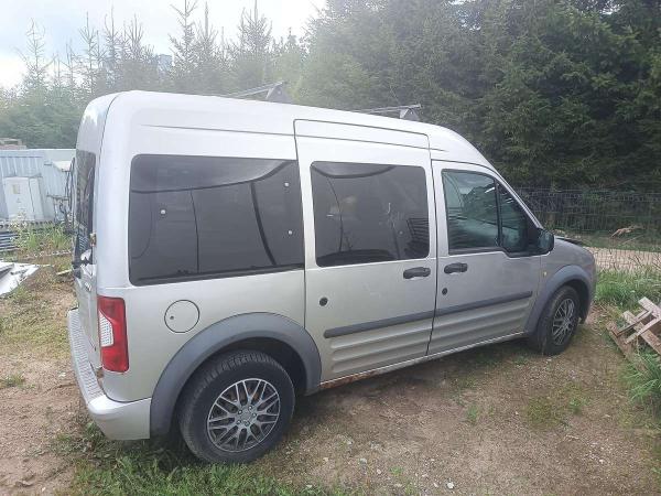 Grey Ford Transit Connect 2012 in Moletai, with an engine capacity of 1.75 L and mileage of 250 thousand km for 990 €, photo 3 on AUTOMOTO.COM.LV