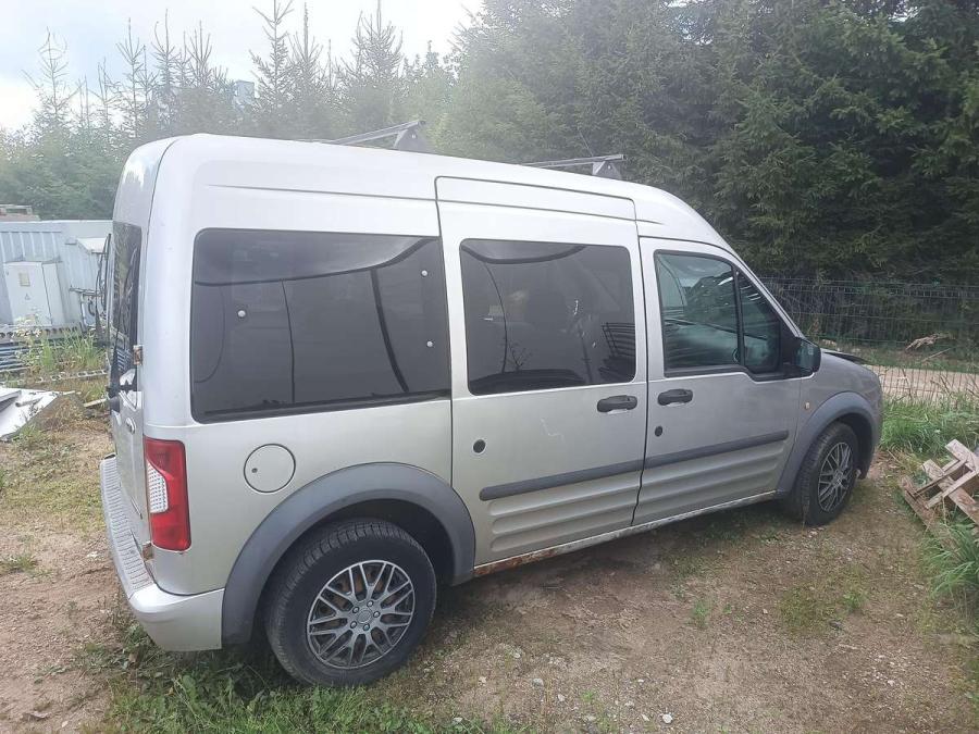 Grey Ford Transit Connect 2012 in Moletai, with an engine capacity of 1.75 L and mileage of 250 thousand km for 990 €, photo 4 on AUTOMOTO.COM.LV