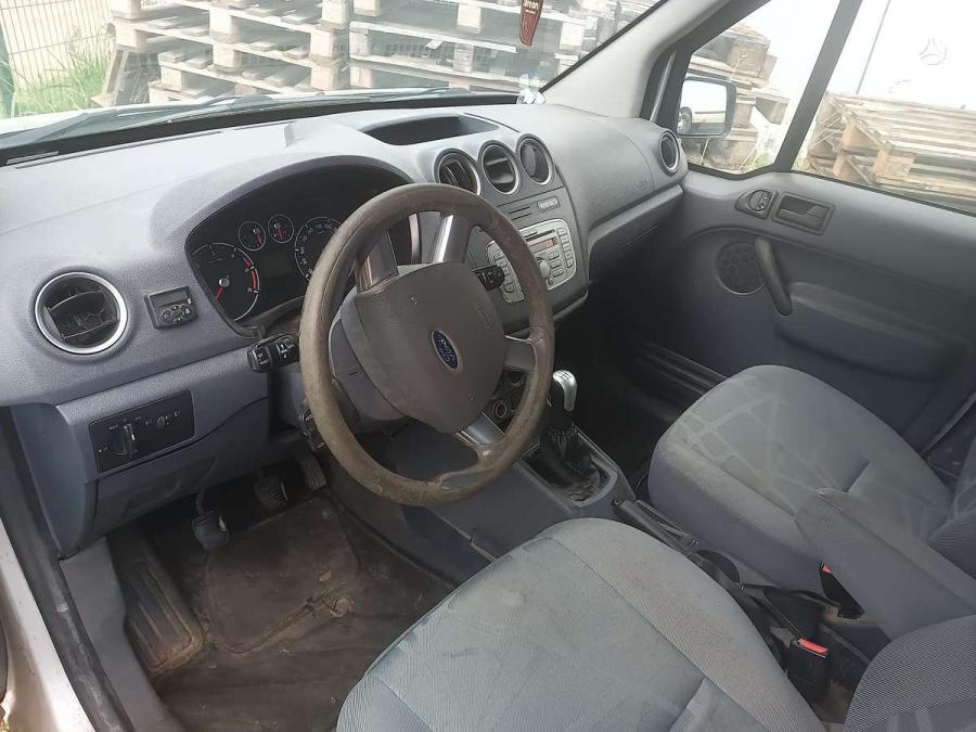 Grey Ford Transit Connect 2012 in Moletai, with an engine capacity of 1.75 L and mileage of 250 thousand km for 990 €, photo 7 on AUTOMOTO.COM.LV