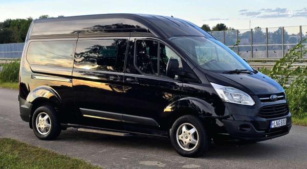Black Ford Transit Custom 2014 in Siauliai, with an engine capacity of 2.20 L and mileage of 330 thousand km for 7850 €, photo 1 on AUTOMOTO.COM.LV