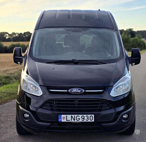 Black Ford Transit Custom 2014 in Siauliai, with an engine capacity of 2.20 L and mileage of 330 thousand km for 7850 €, photo 4 on AUTOMOTO.COM.LV
