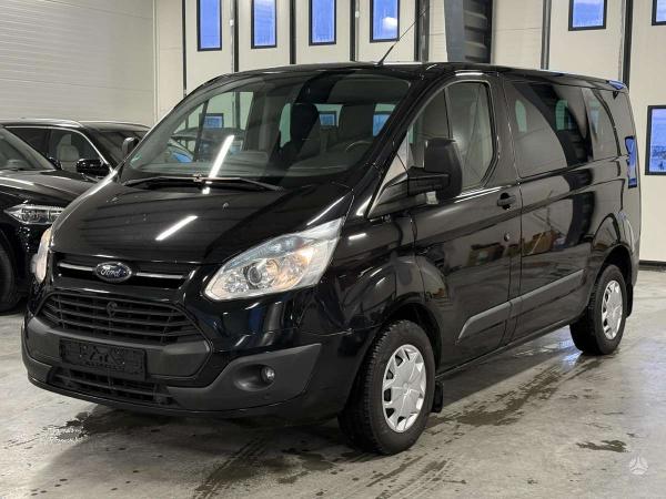 Black Ford Transit Custom 2015 in Marijampole, with an engine capacity of 2.20 L and mileage of 238 thousand km for 11500 €, photo 4 on AUTOMOTO.COM.LV