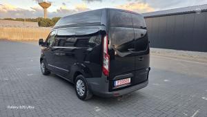 Black Ford Transit Custom 2016 in Klaipeda, with an engine capacity of 2.20 L and mileage of 237 thousand km for 7990 €, photo 3 on AUTOMOTO.COM.LV