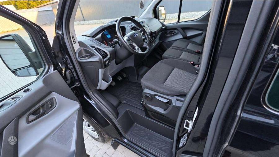 Black Ford Transit Custom 2016 in Klaipeda, with an engine capacity of 2.20 L and mileage of 237 thousand km for 7990 €, photo 4 on AUTOMOTO.COM.LV